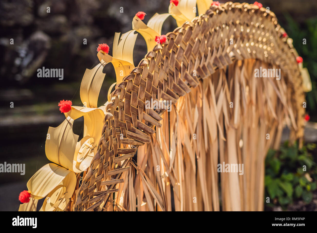 Traditional Bali Penjor - bamboo pole with decoration on village street ...