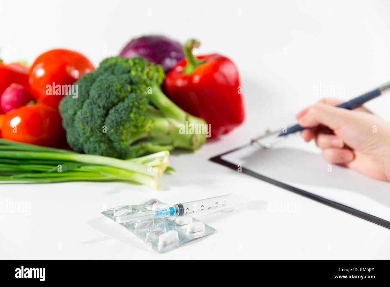 Vegetable diet nutrition or medicaments concept. Female person hands ...