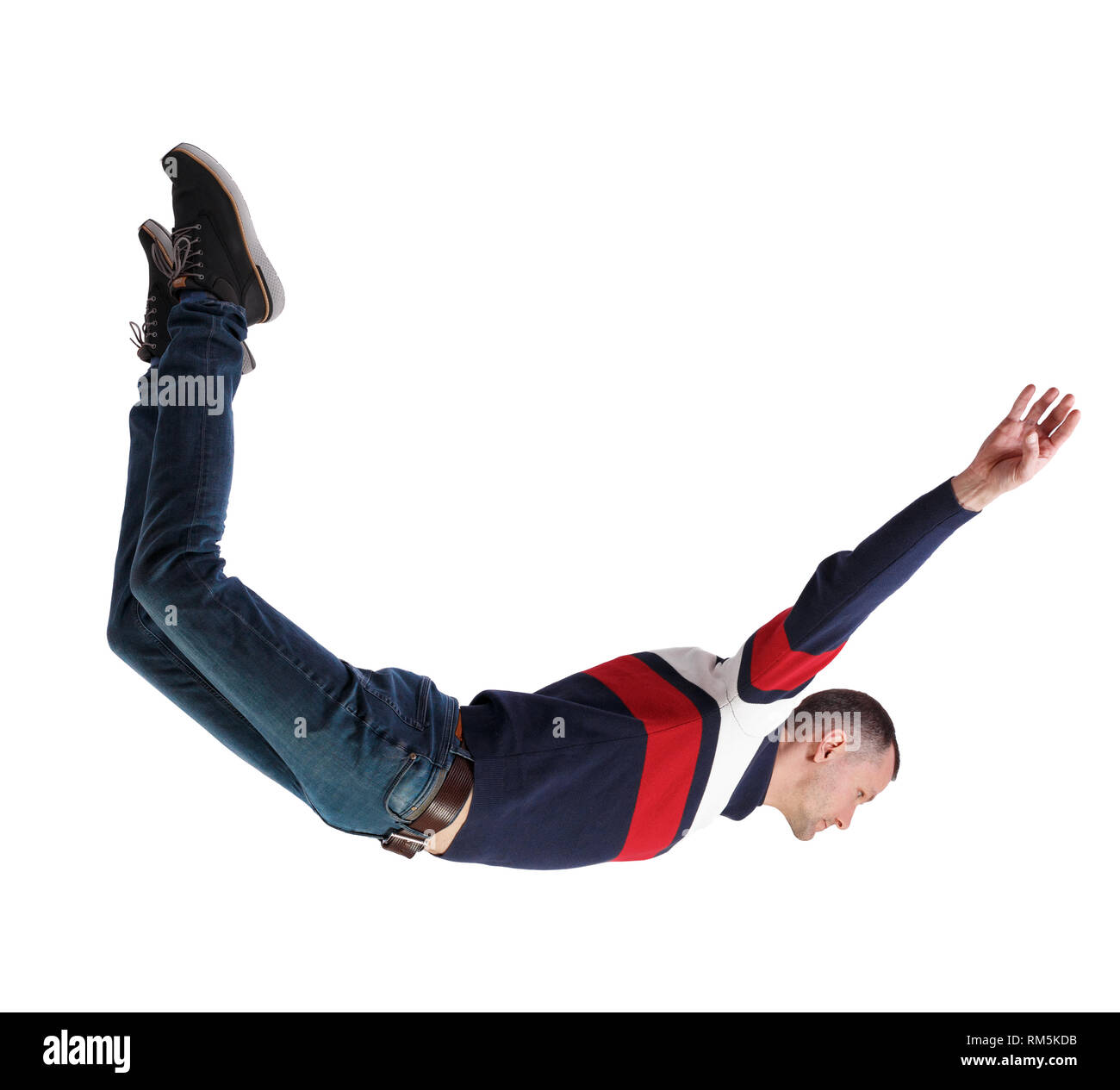 Side view of man in zero gravity or a fall. guy is flying, falling or ...