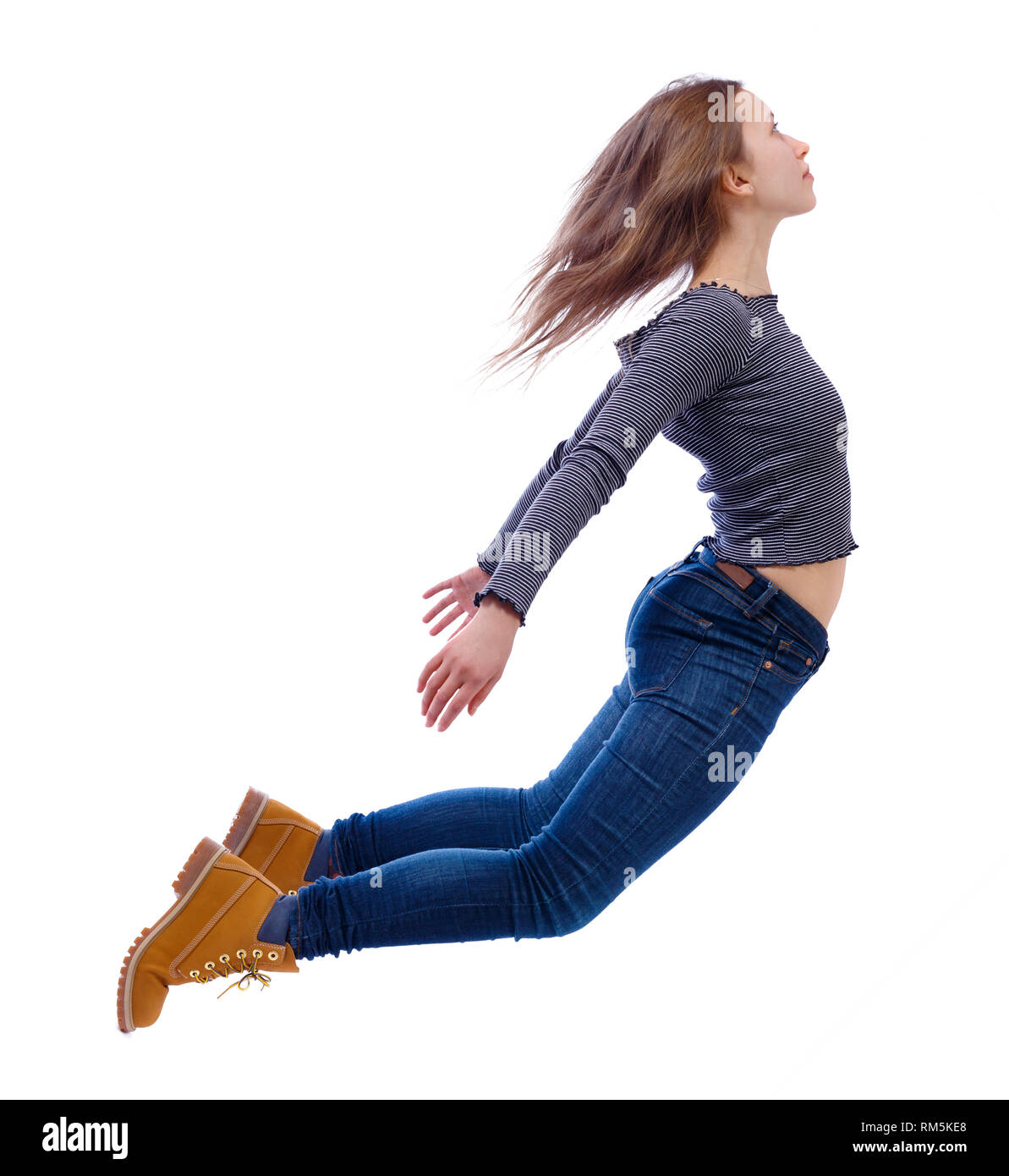 Side view of woman in zero gravity or a fall. girl is flying, falling ...