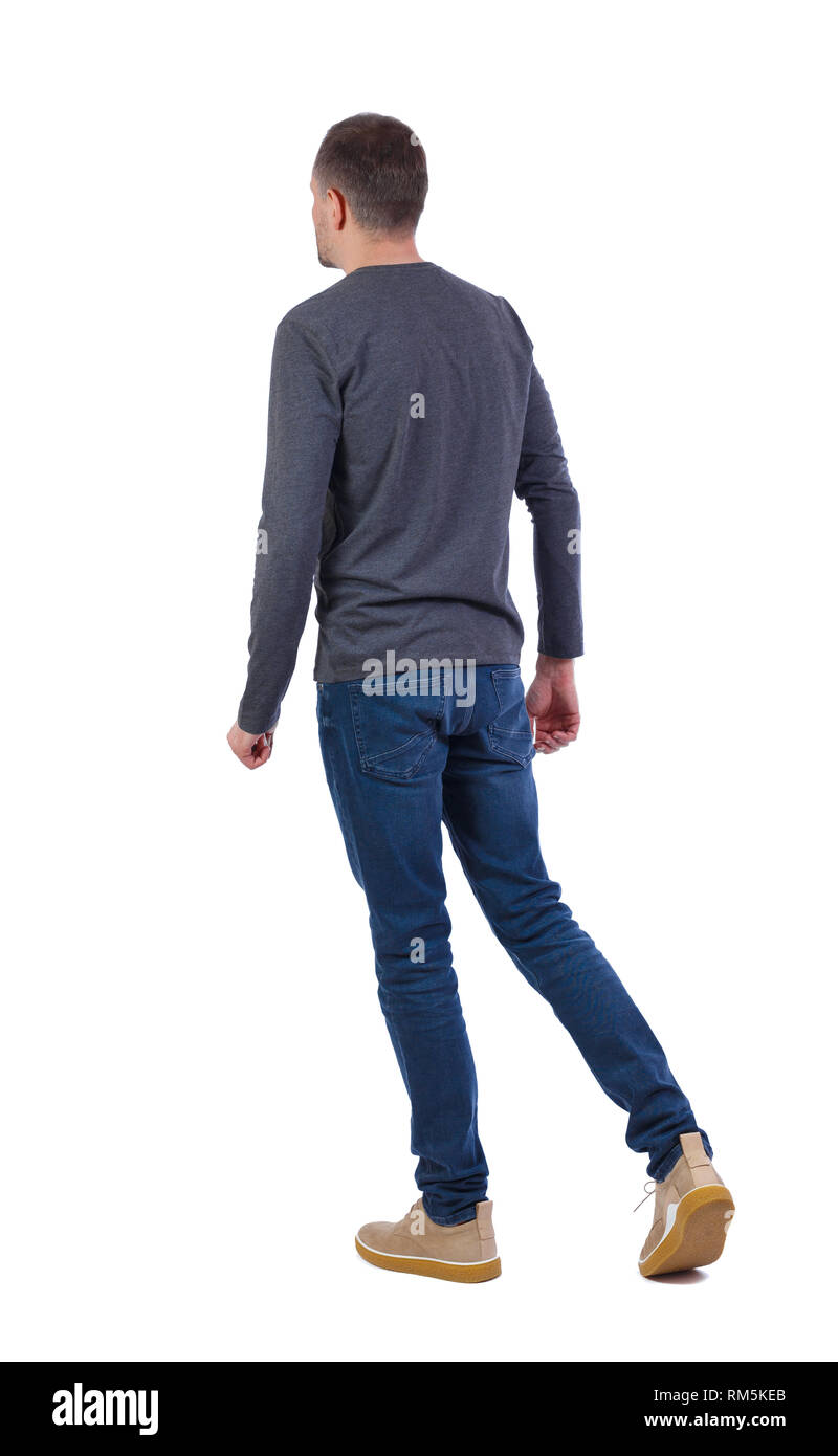 Back view of going handsome man . walking young guy . Rear view people ...