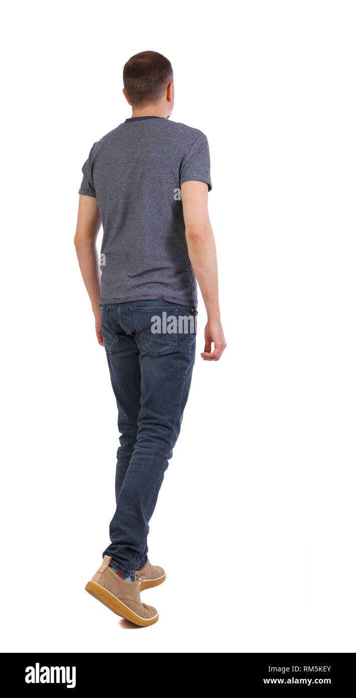 Back view of going handsome man . walking young guy . Rear view people ...