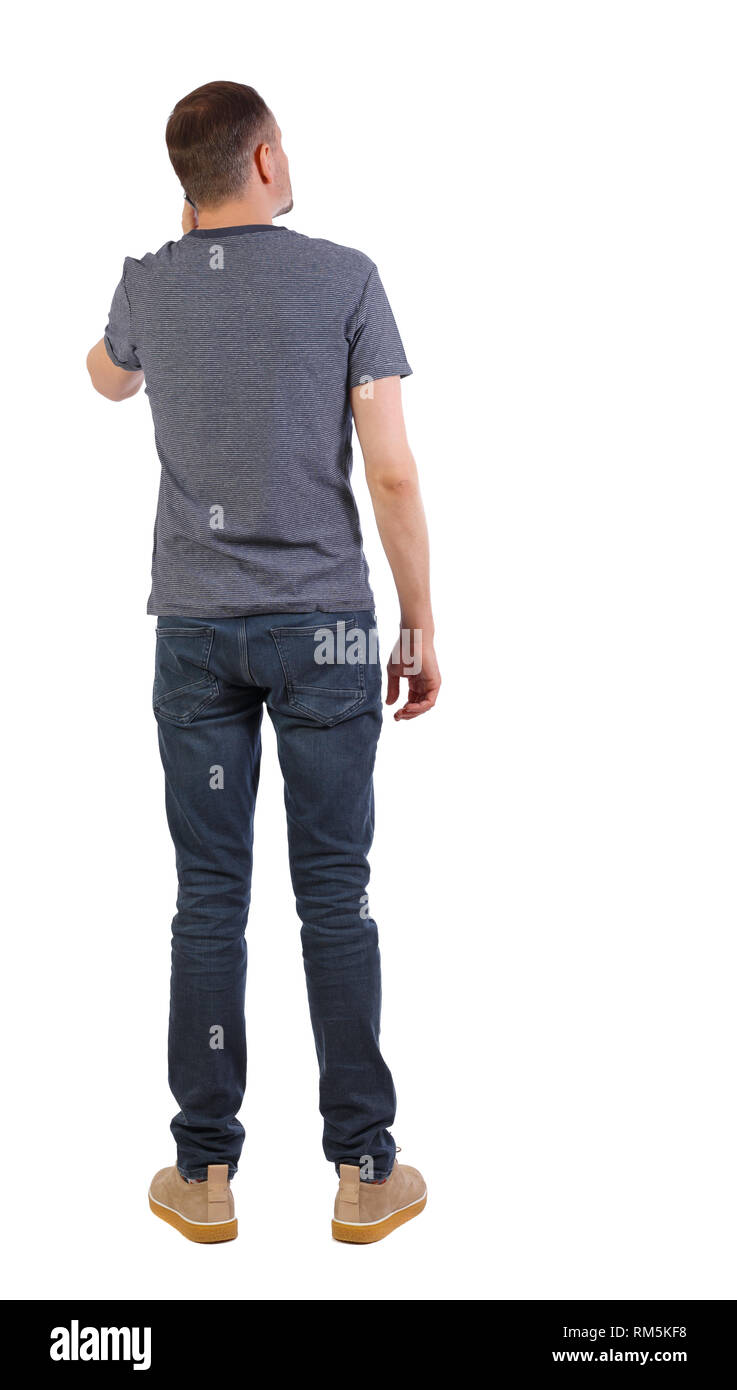 back view of a man talking on the phone. backside view of person. Rear ...