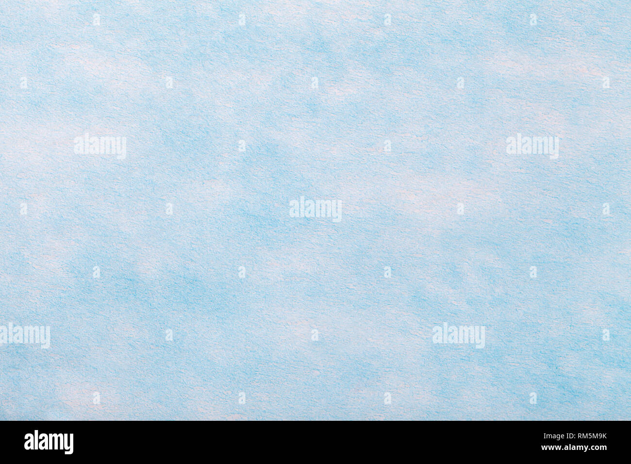 Construction of a light blue background with white spots of felt fabric ...