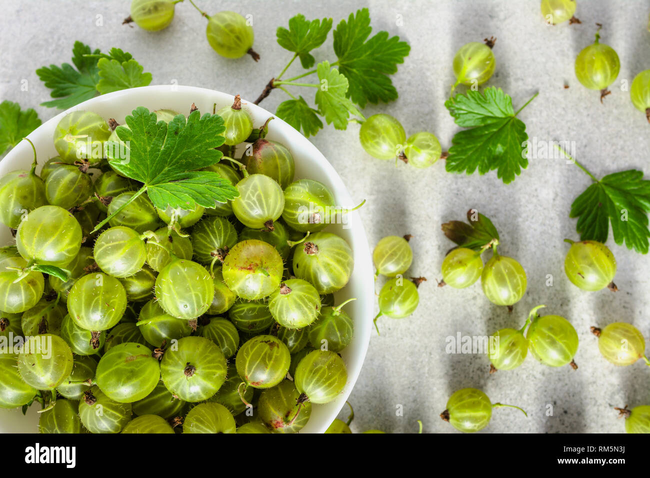 Green fresh gooseberry, summer fruit, top view Stock Photo - Alamy