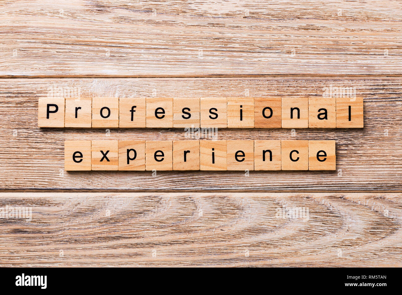 professional experience word written on wood block. professional ...