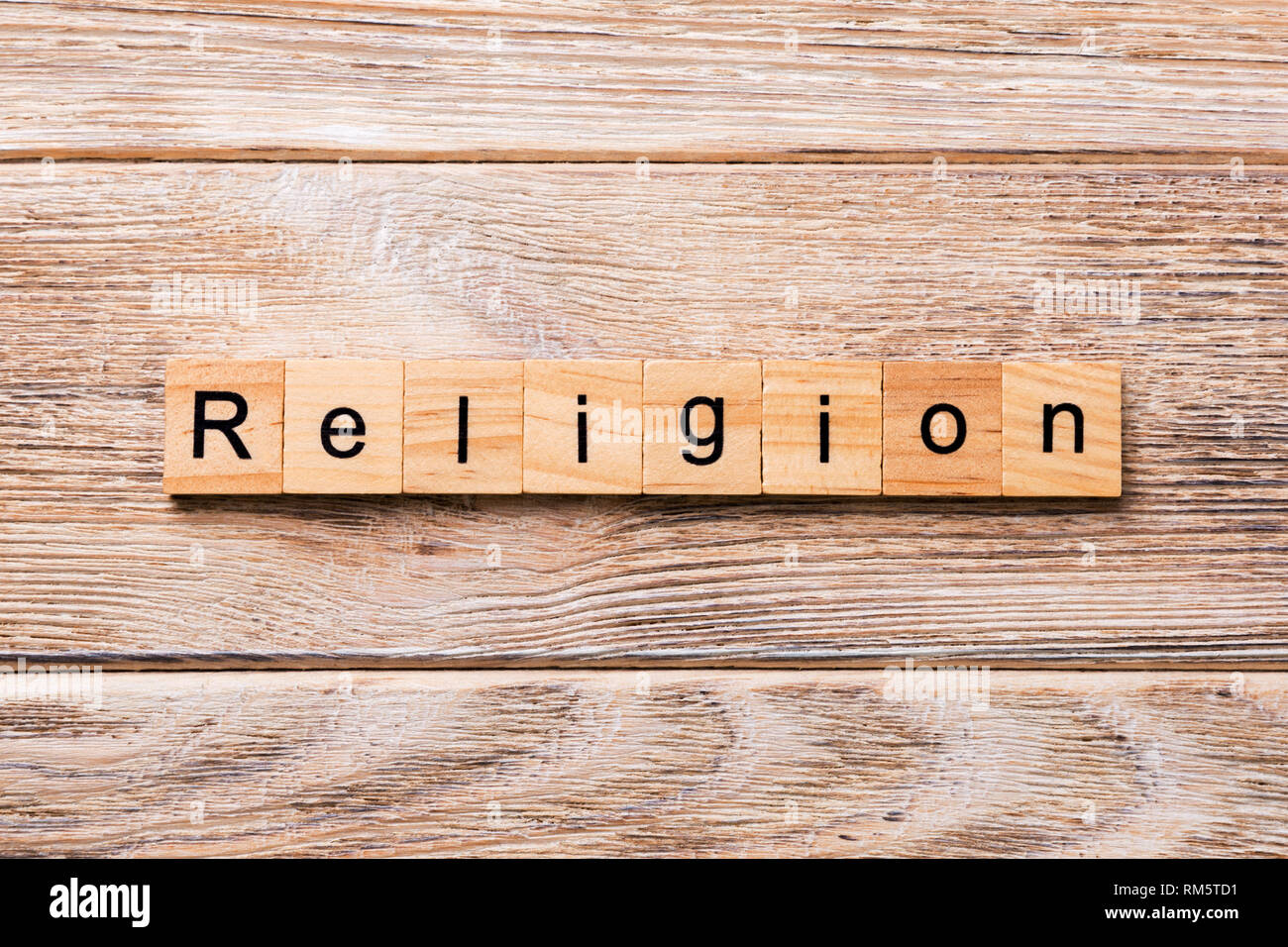 Religion word written on wood block. Religion text on wooden table for ...