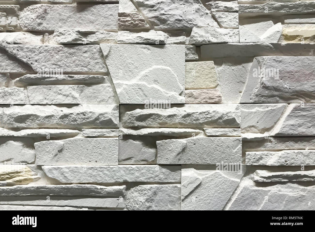 Stone wall with rectangle stones interior craft design Stock Photo - Alamy