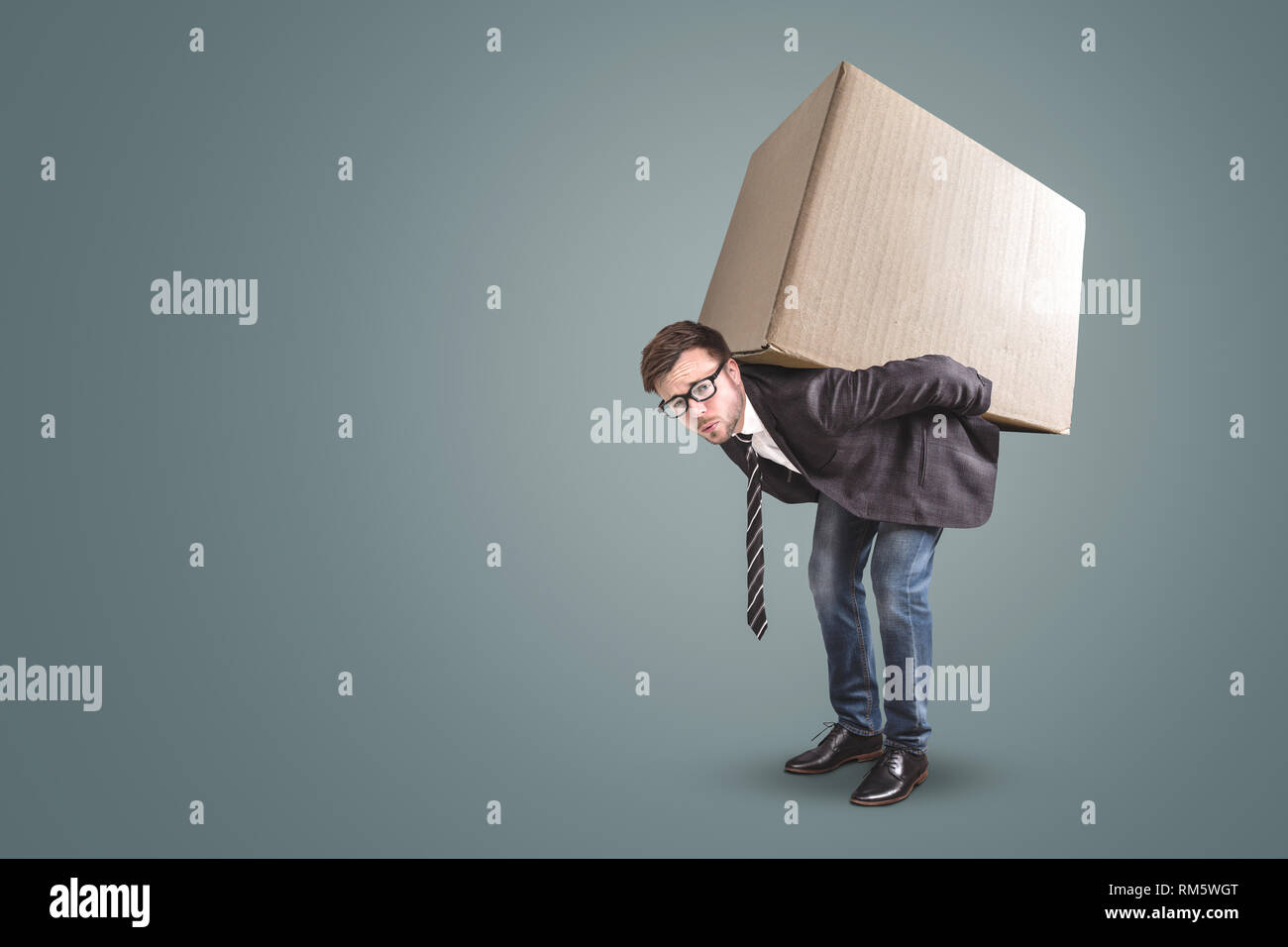 Carrying a heavy box hi-res stock photography and images - Alamy