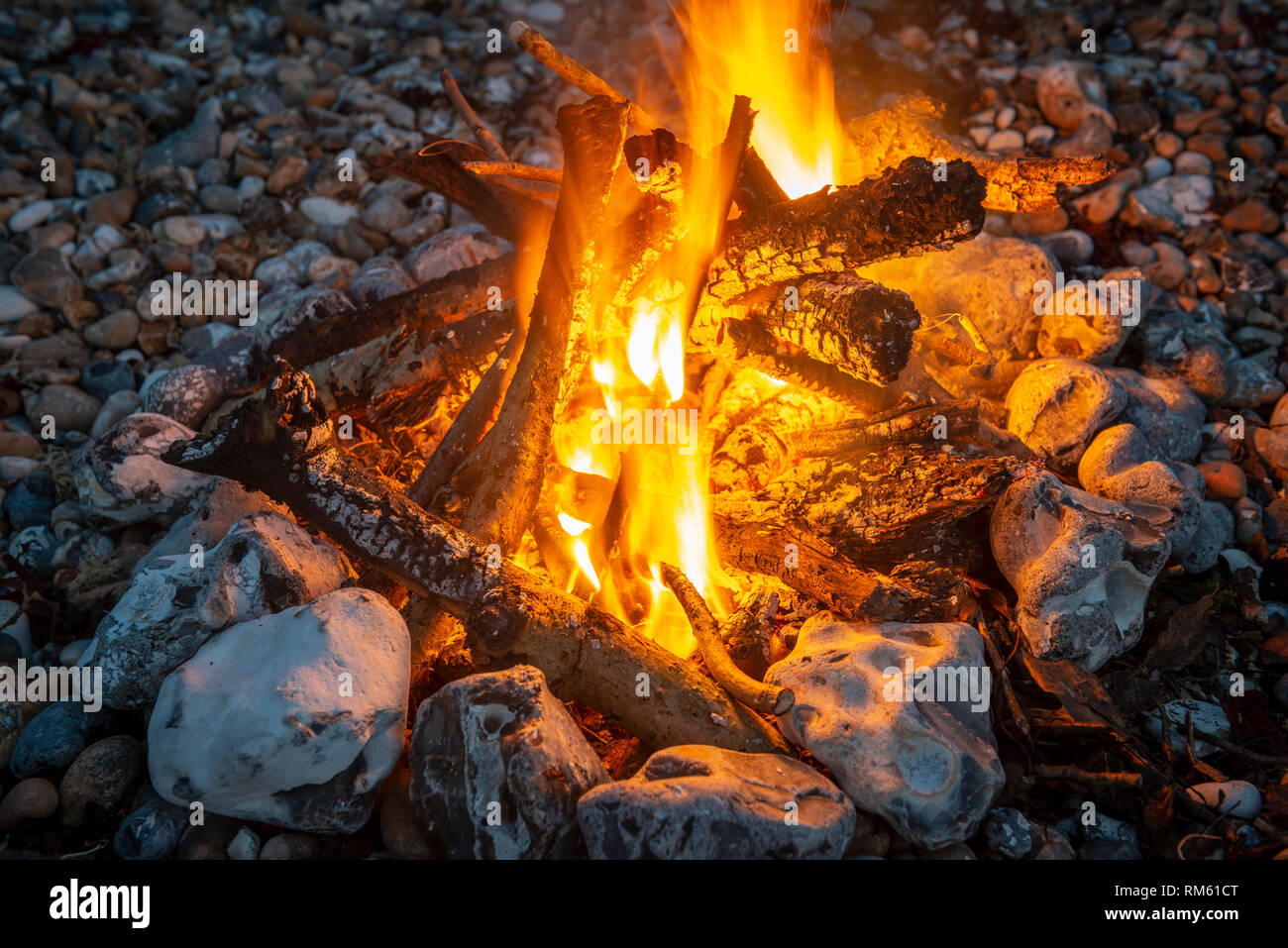 Burn fire wood on beach hi-res stock photography and images - Alamy