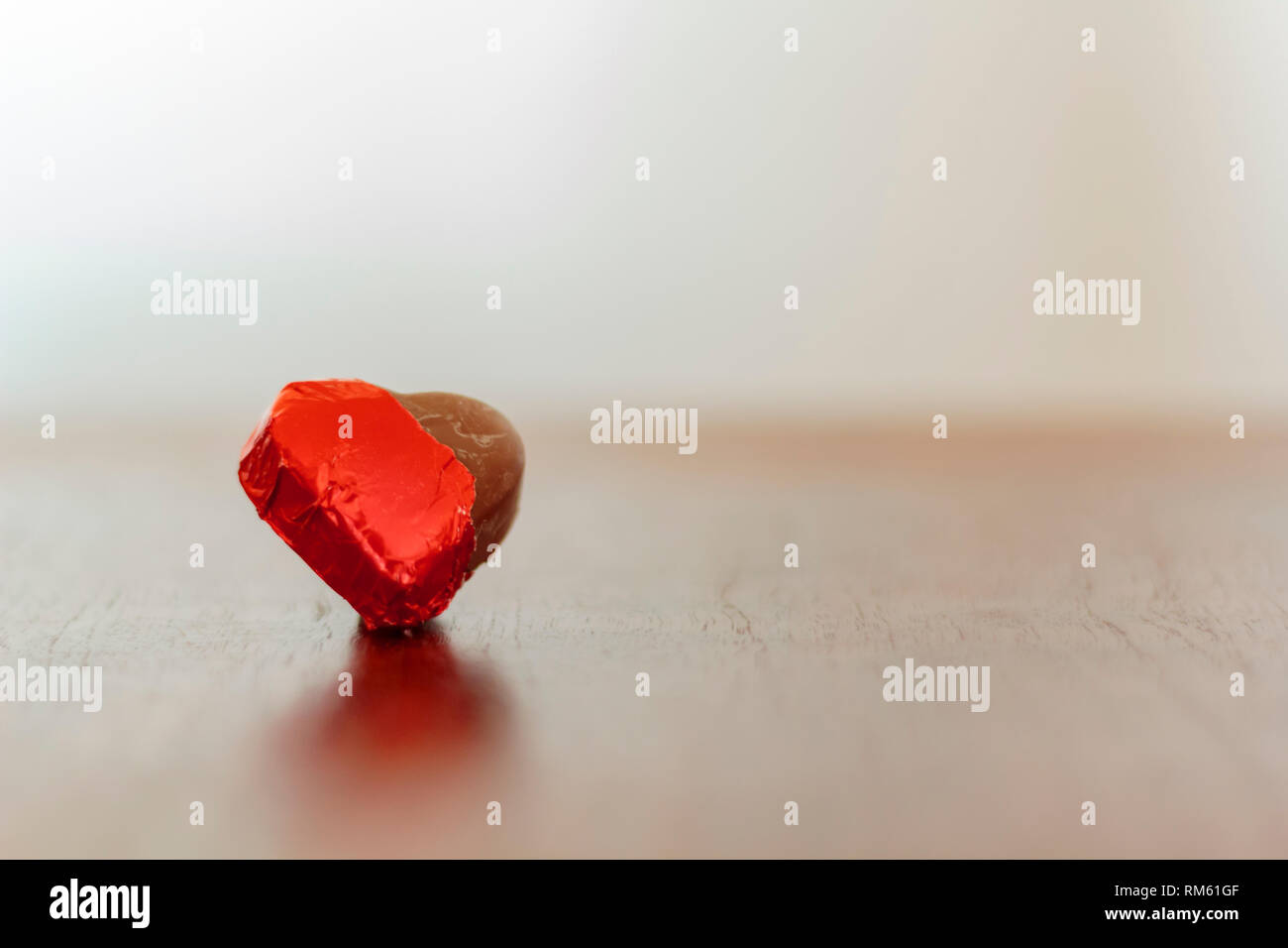 Chocolate heart half open with copy space Stock Photo - Alamy