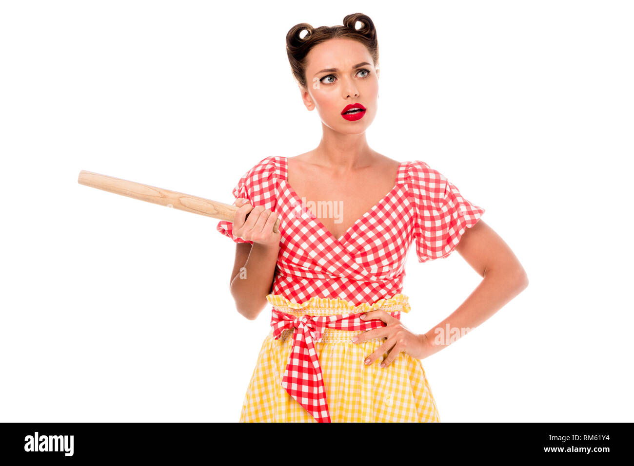 Girl holding rolling pin hi-res stock photography and images - Alamy