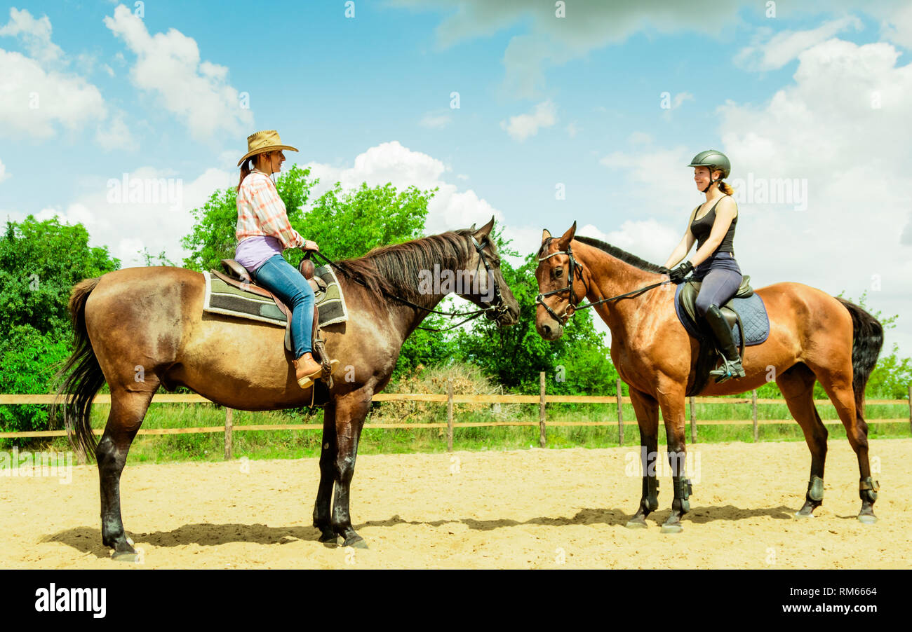 Active women western cowgirl and jockey training riding horse. American ...