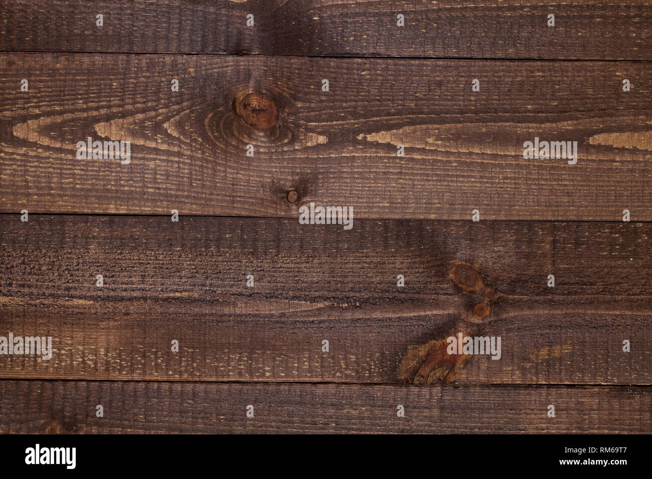 Close up of dark rustic wall made of old wood table planks texture ...