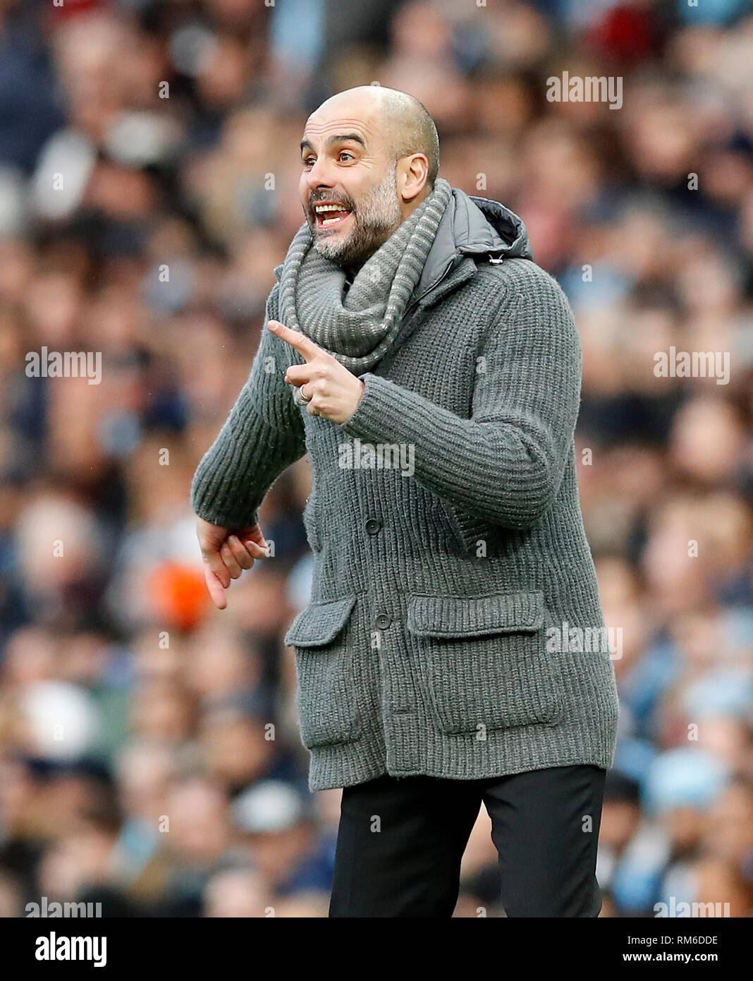 Manchester City manager Pep Guardiola gestures on the touchline Stock ...