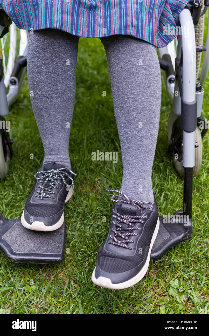 Woman feet up chair outside hi-res stock photography and images - Alamy