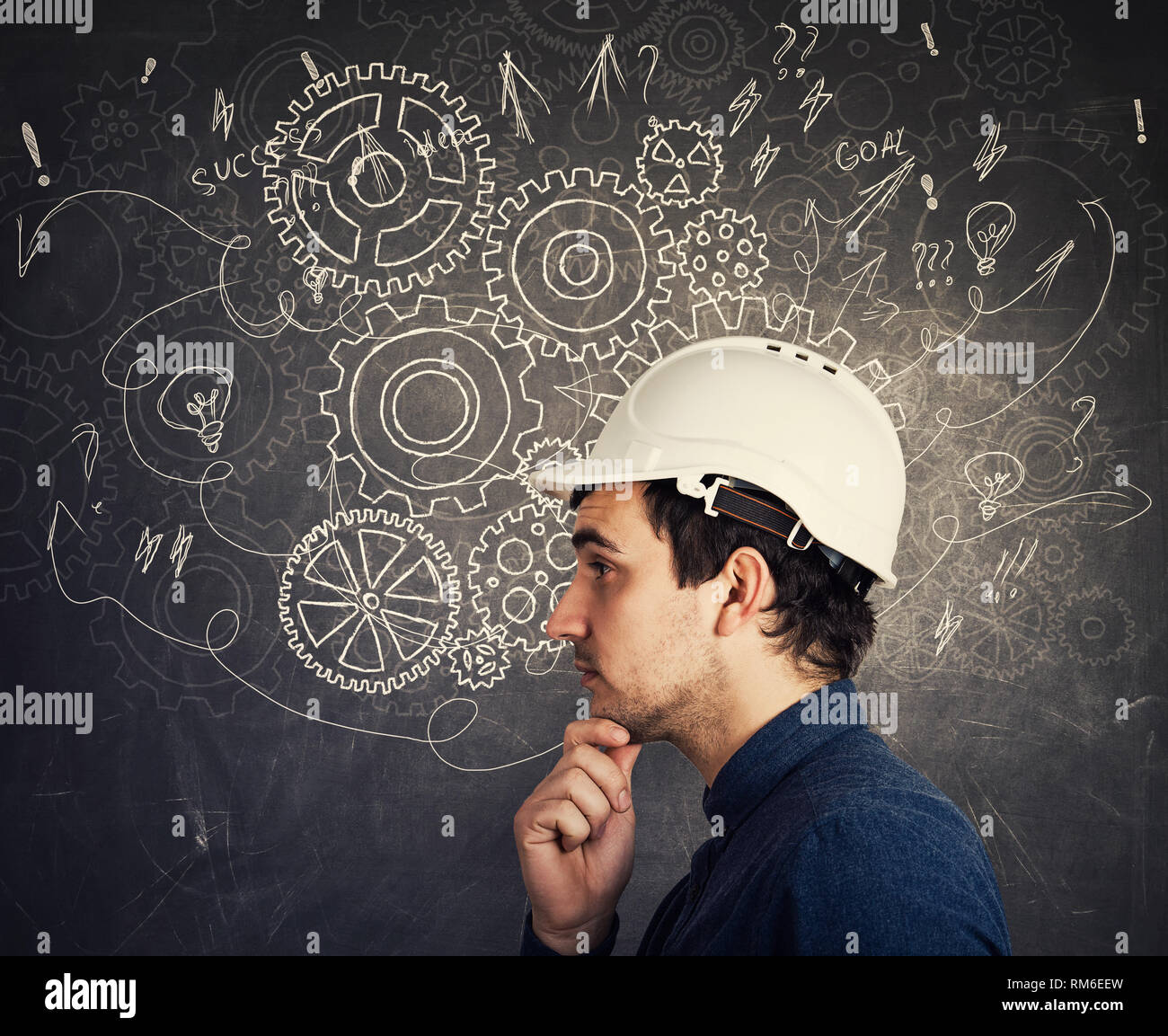 Hard thinking pensive engineer hand under chin looking thoughtful ...