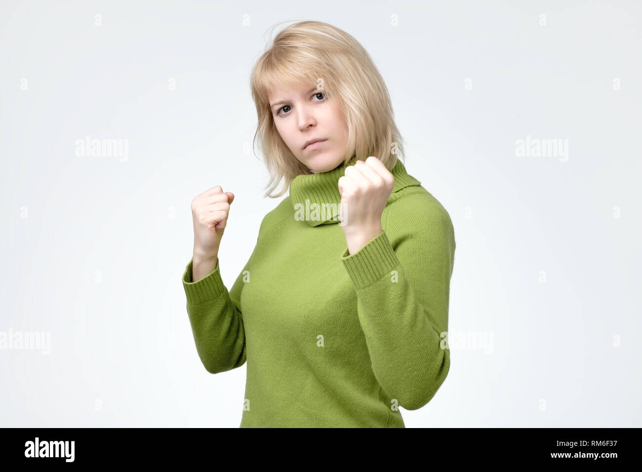Anger woman fist hi-res stock photography and images - Alamy