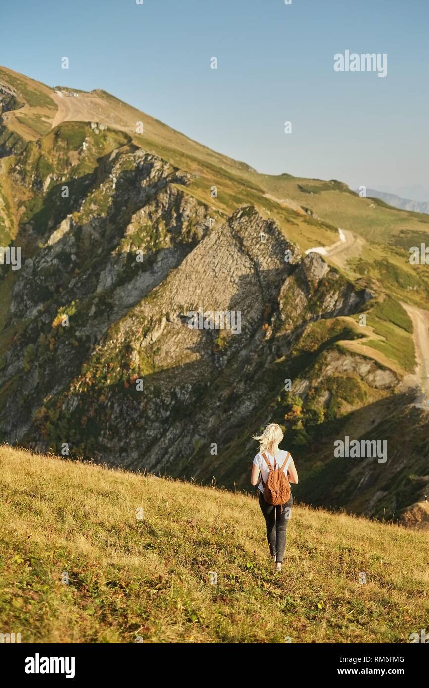 Beautiful hiker girl heavy backpack hi-res stock photography and images - Alamy