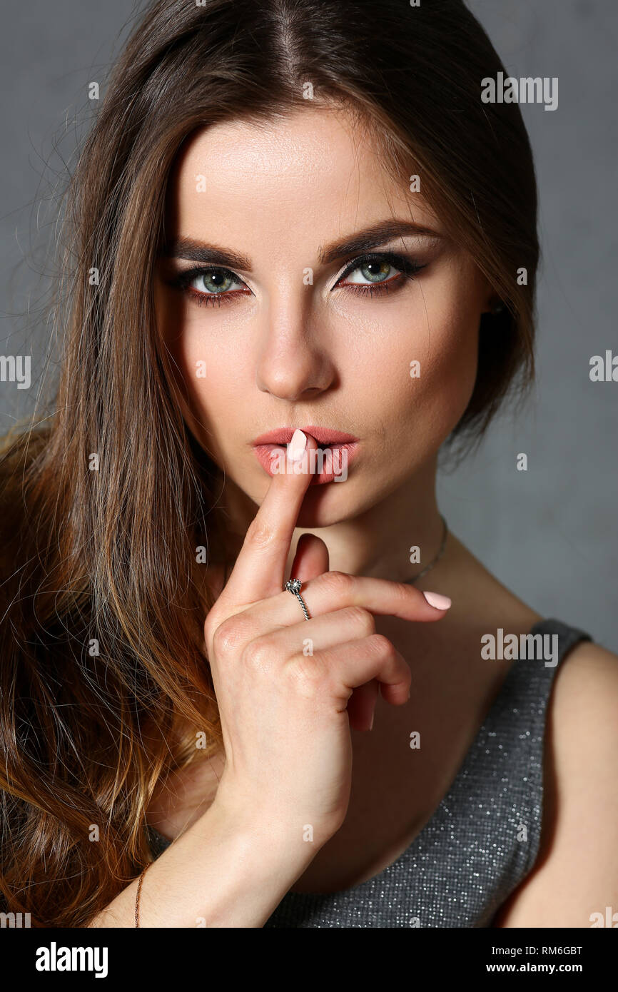 Happy beautiful brunette facial expression hi-res stock photography and ...