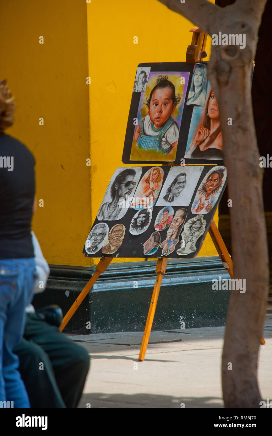Portraits sold on the road at Lima,Peru Stock Photo - Alamy