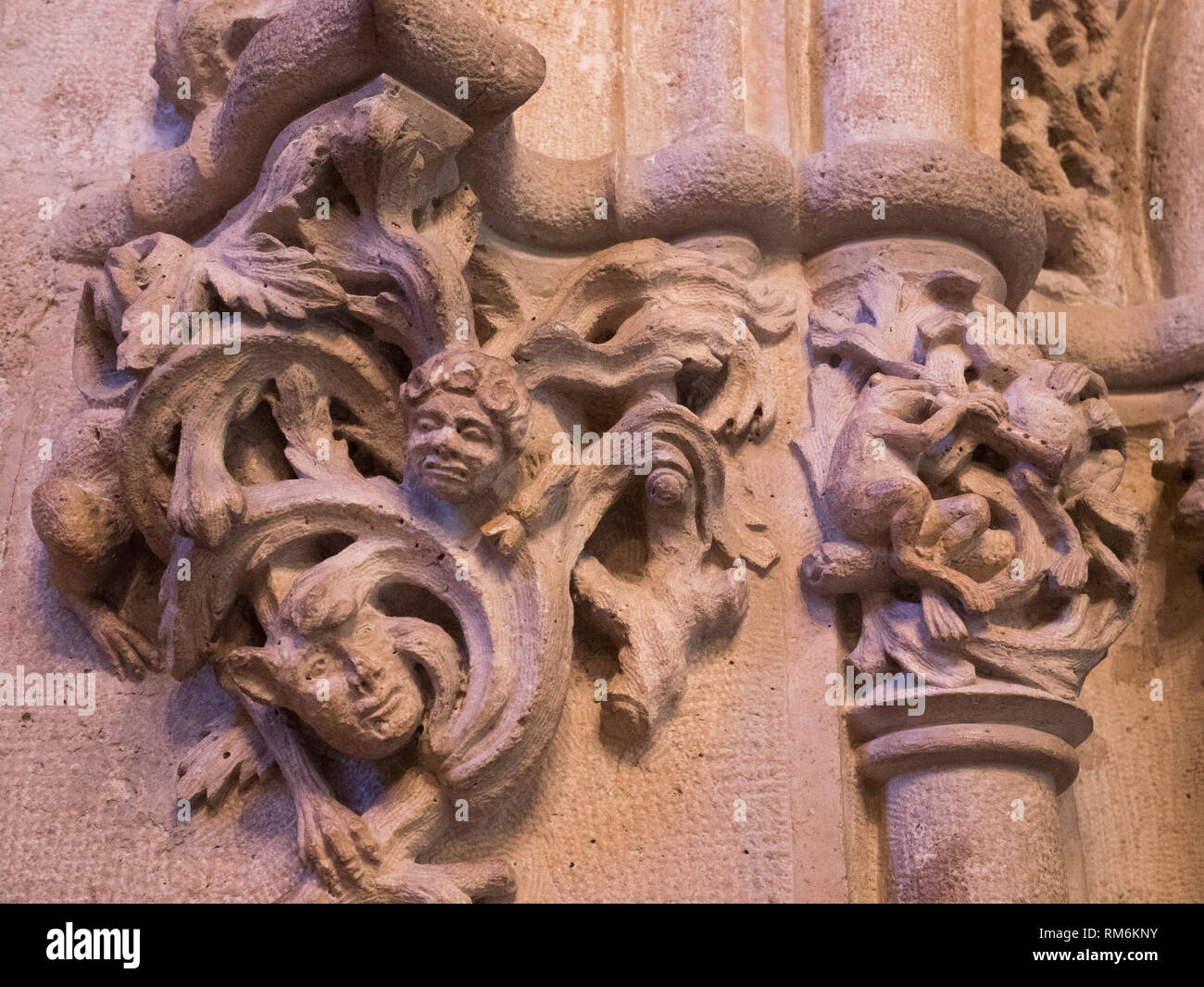 ornaments and sculptures of the Gothic period on the gates of a church ...