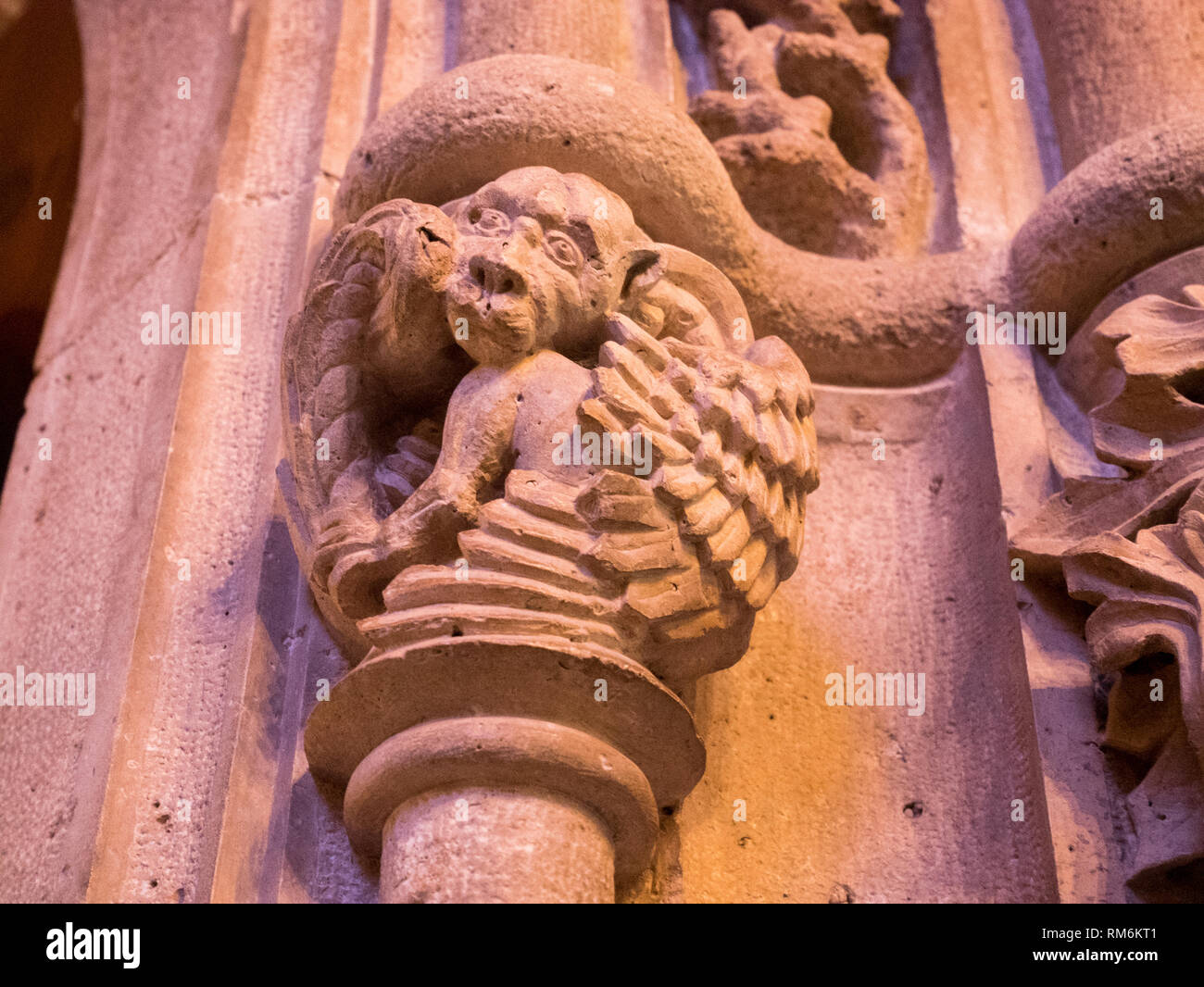 ornaments and sculptures of the Gothic period on the gates of a church ...