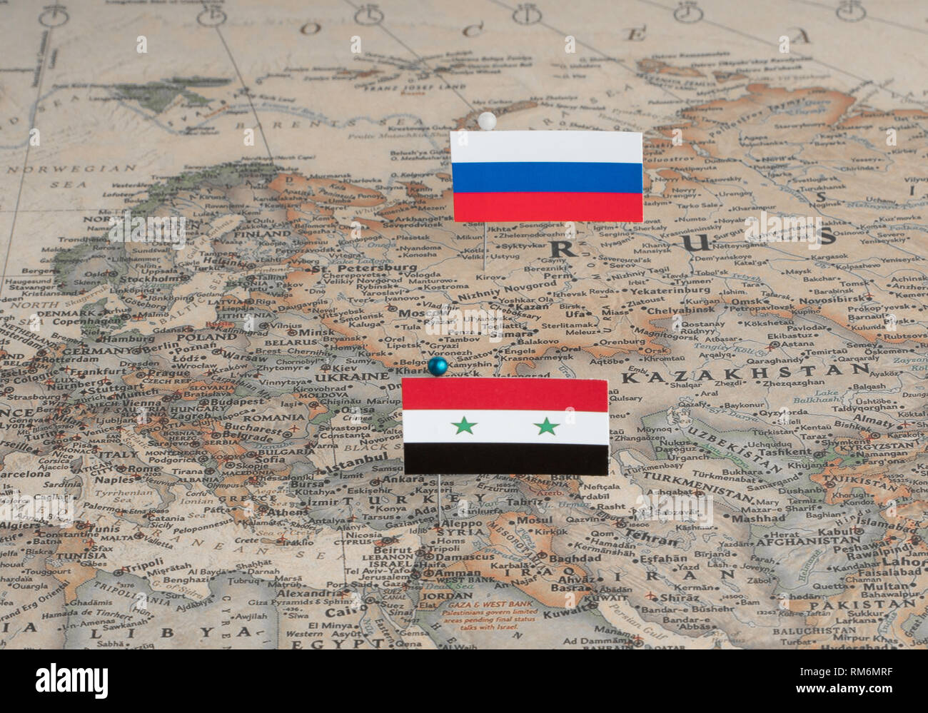 Flags of Russia and Syria on the world map. Conceptual photo, politics ...
