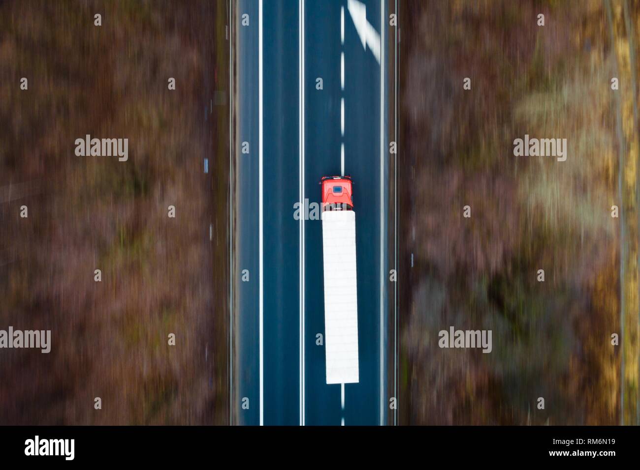 Aerial drone view on TIR truck on asphalt road. Transport and logistic ...