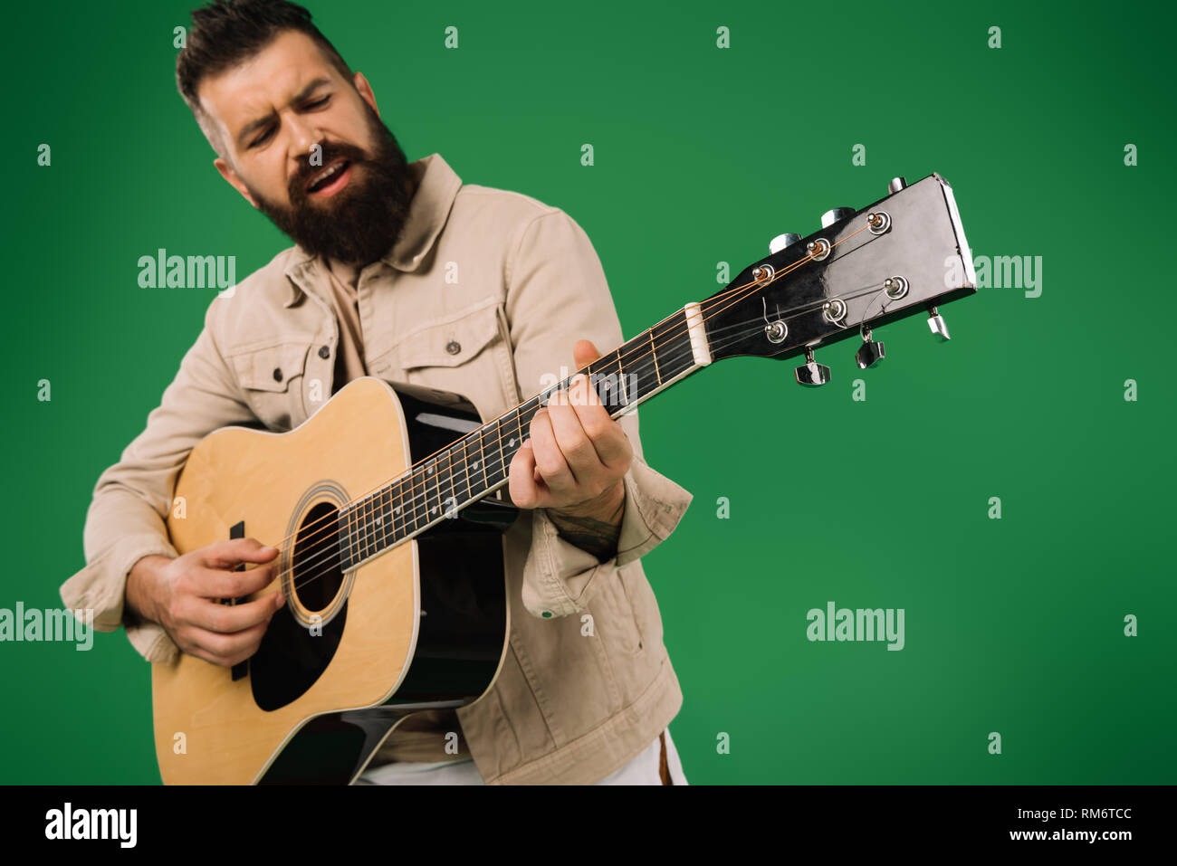 Bearded male musician playing hi-res stock photography and images - Alamy