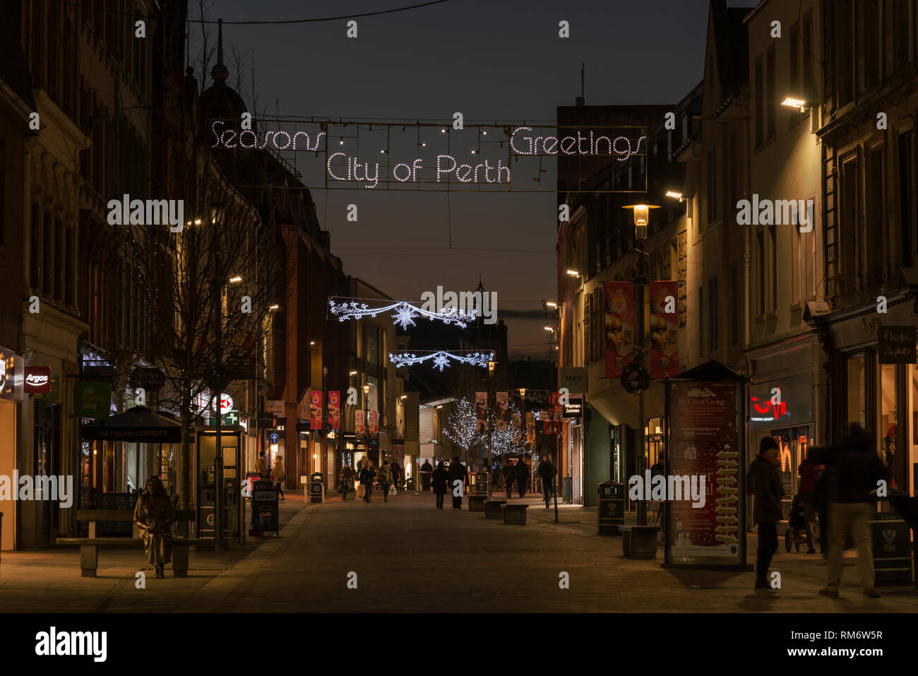 Shoppers in the High Street at dusk in Perth, Scotland, UK Stock Photo ...