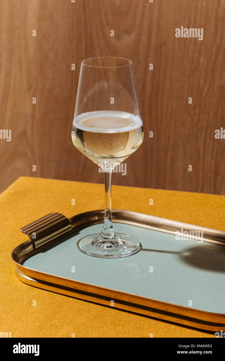Glass filled with sparkling Franciacorta spumante, in pop contemporary ...