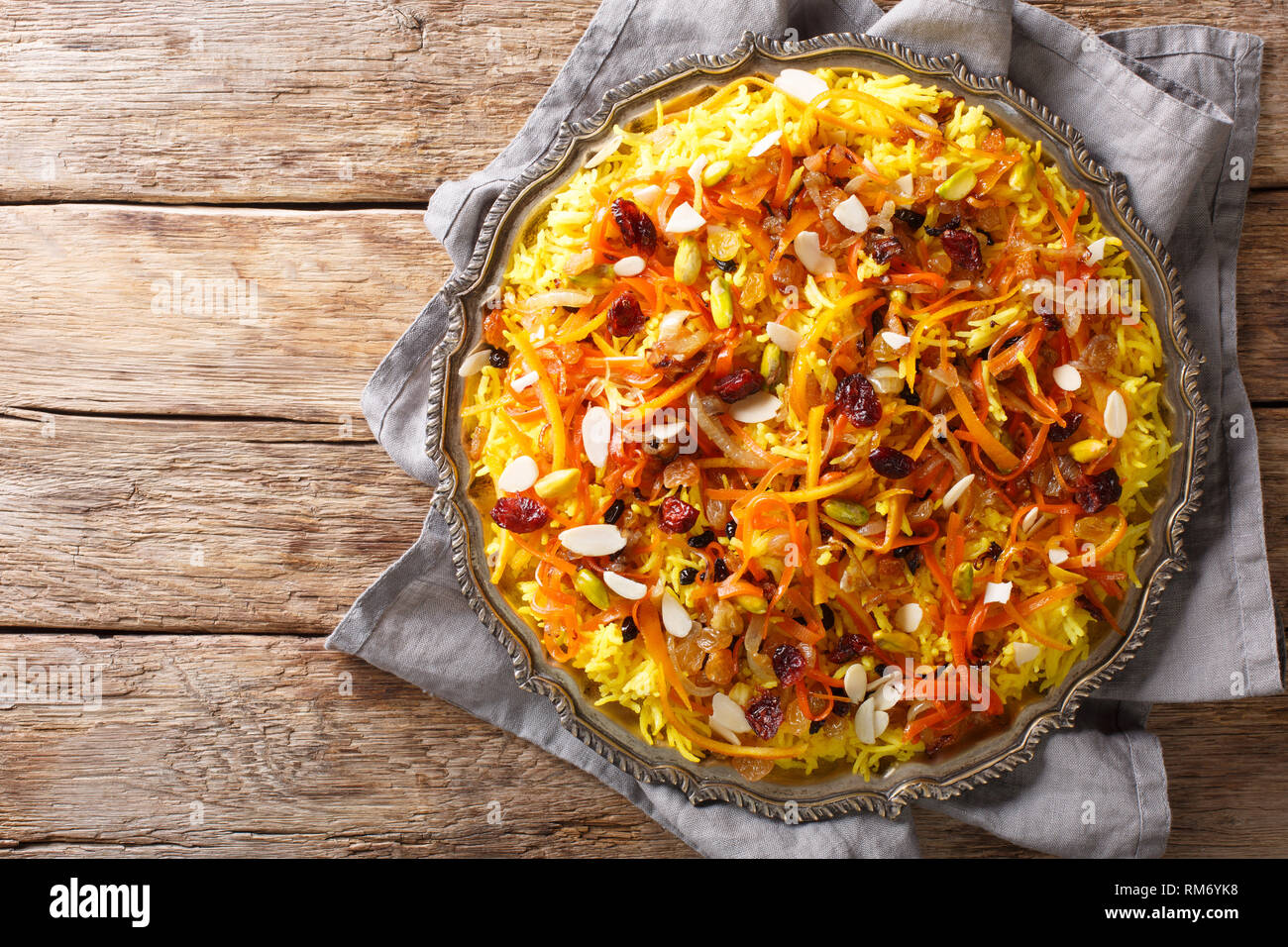 Javaher Polow (jeweled rice) is a traditional Persian rice dish closeup ...