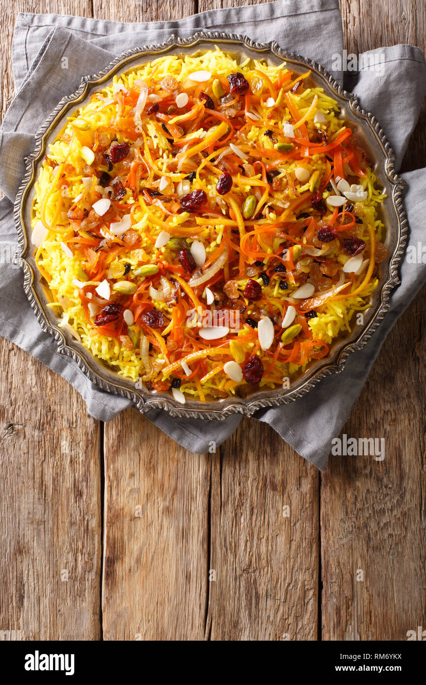 Javaher Polow (jeweled rice) is a traditional Persian rice dish closeup ...