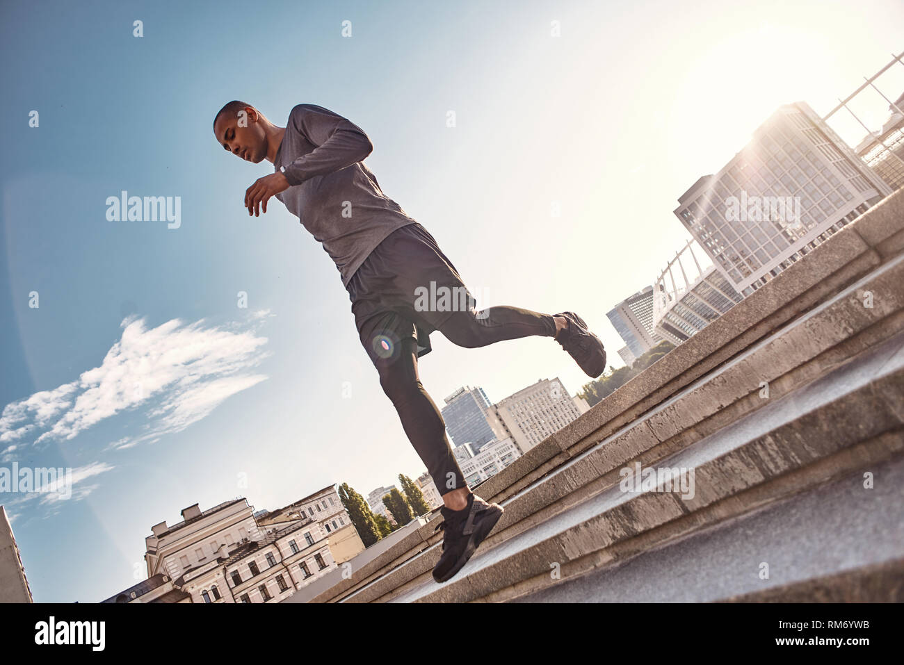Full of energy Full length portrait of athletic african man running on ...