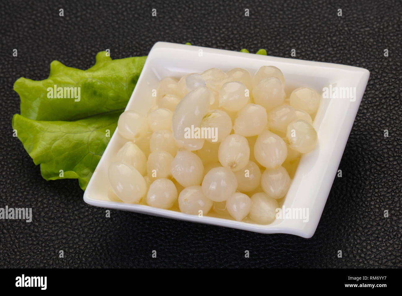 Pickled baby onion in the bowl Stock Photo - Alamy