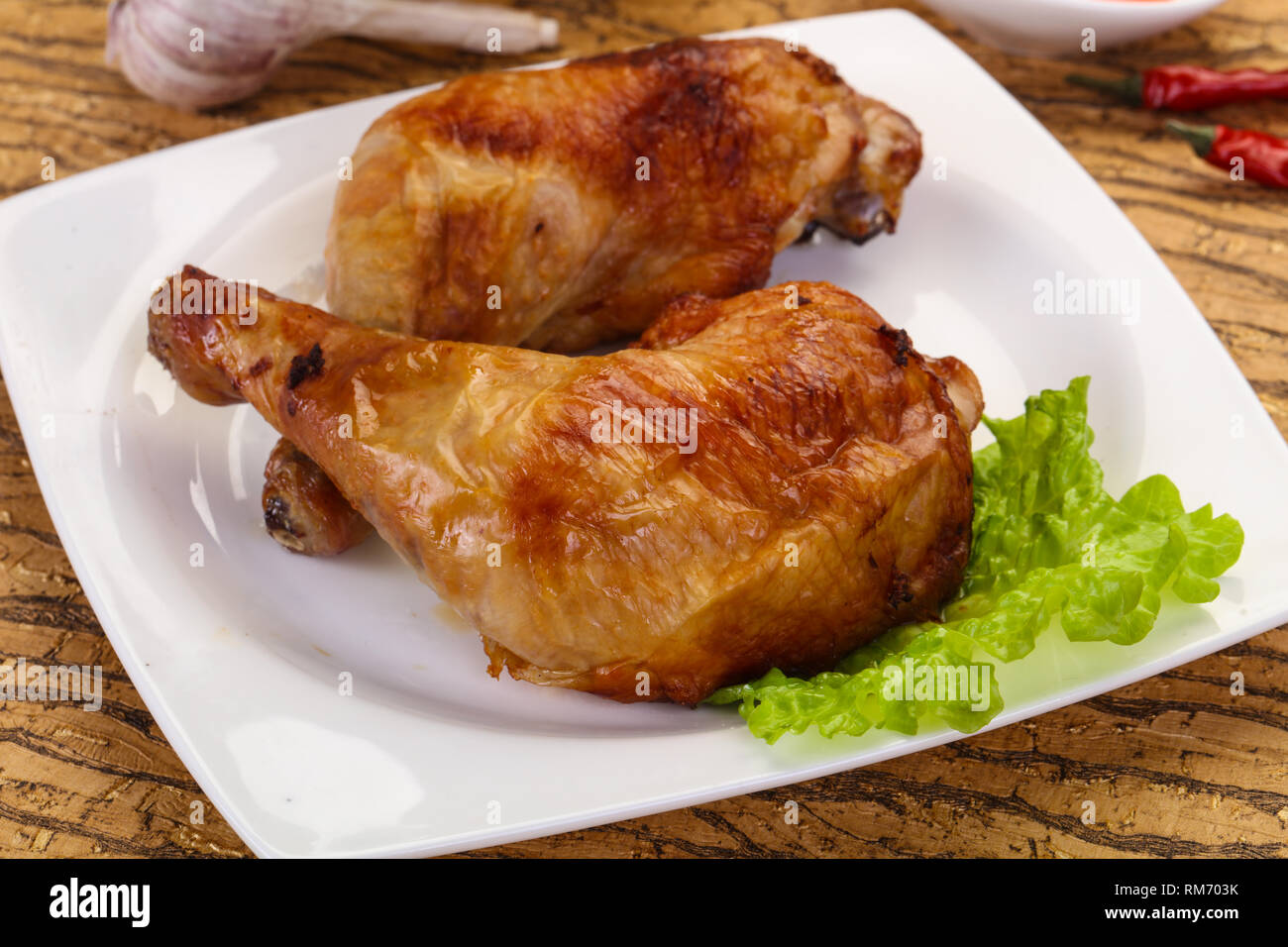 Crispy tasty Roasted chicken leg Stock Photo - Alamy