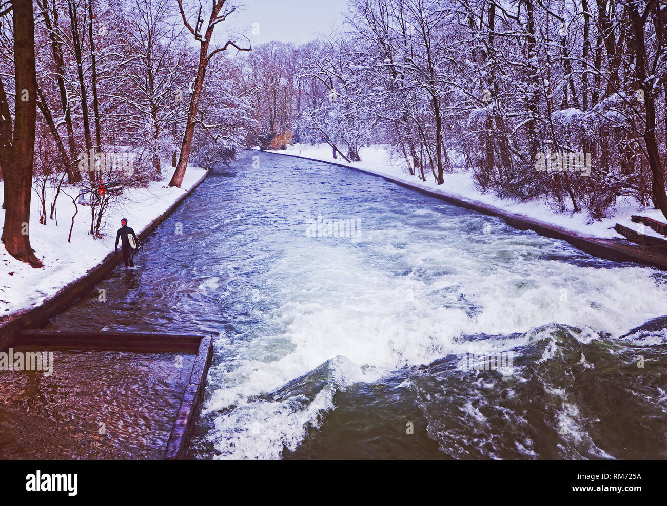 MUNICH, GERMANY - FEBRUARY 5, 2019 - Munich, surfer ready to ride the ...