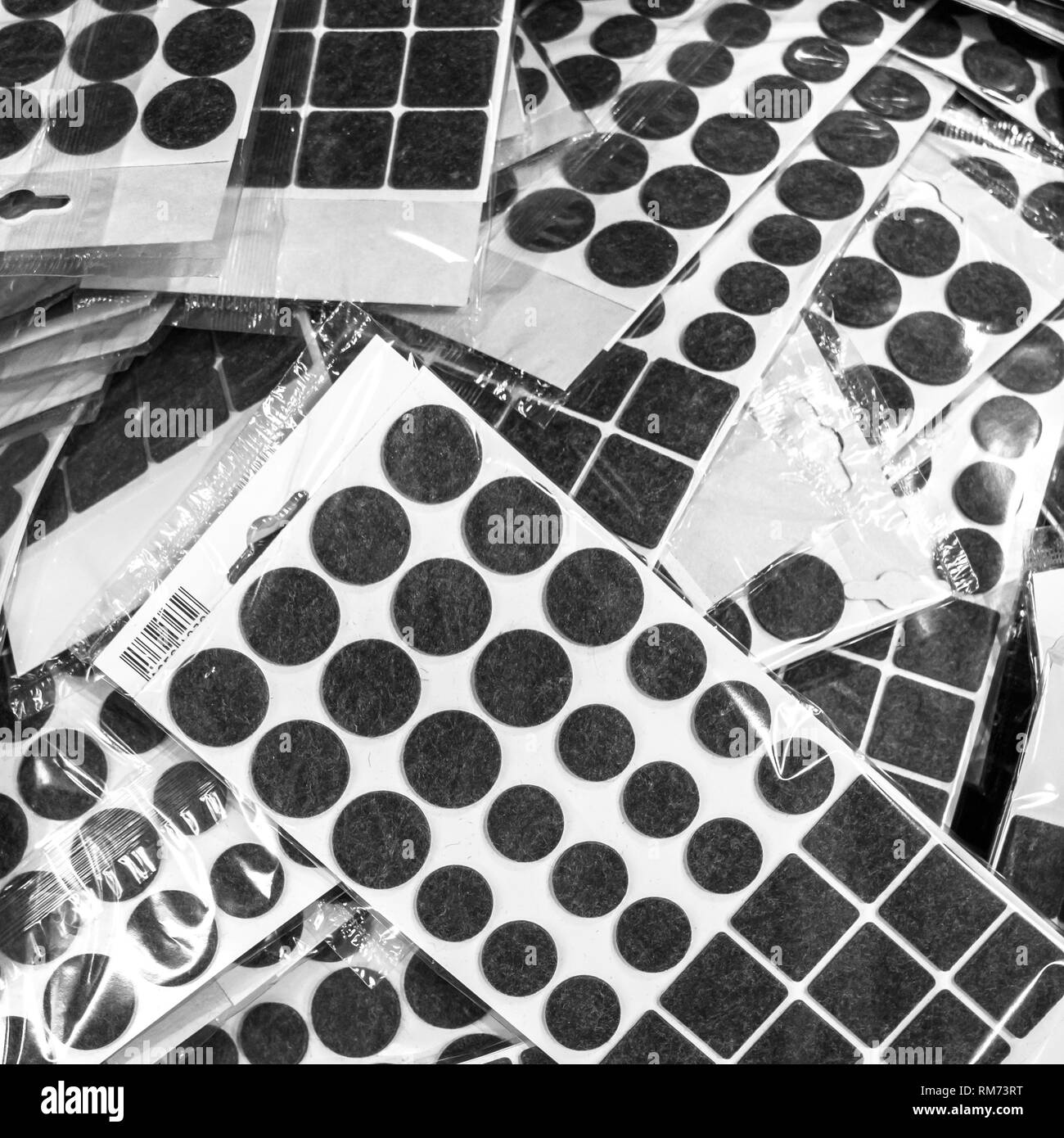 Felt surface protectors for protecting furniture Stock Photo - Alamy