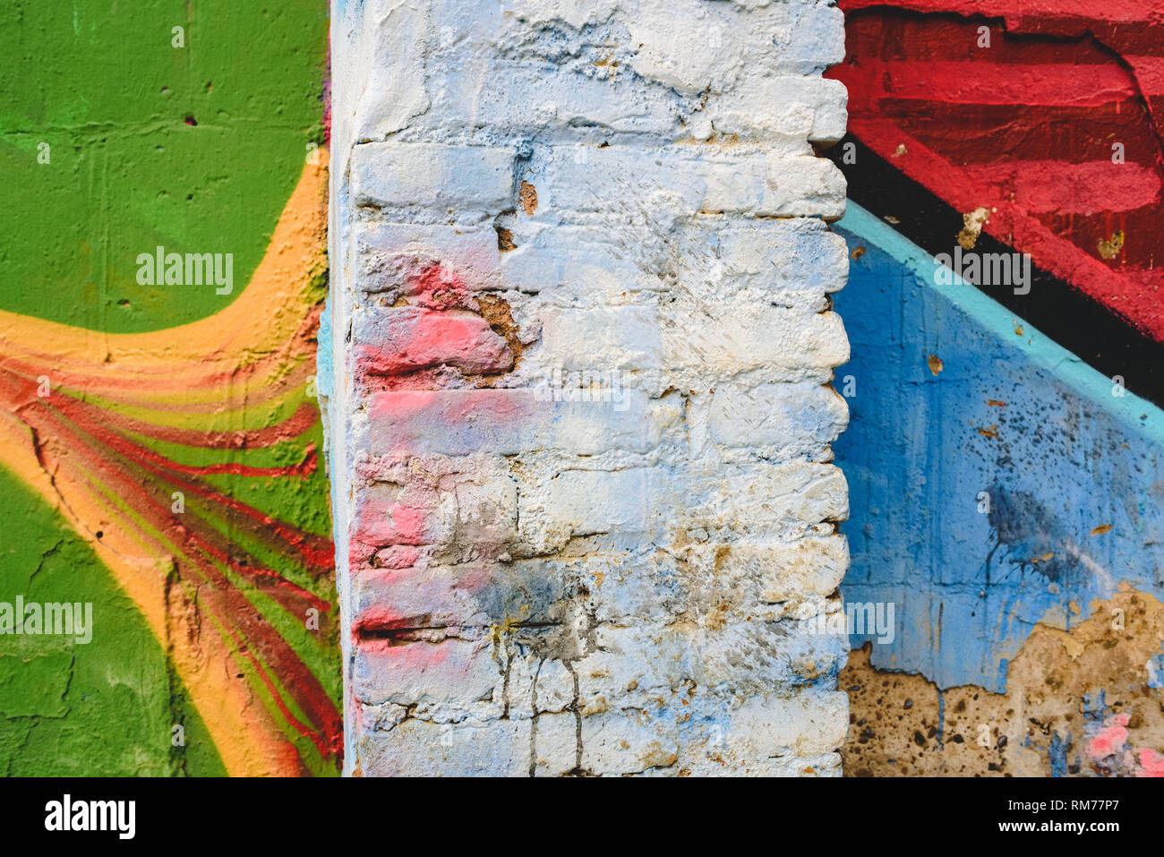 Detail of an anonymous street graffiti with many colors, cheerful urban ...