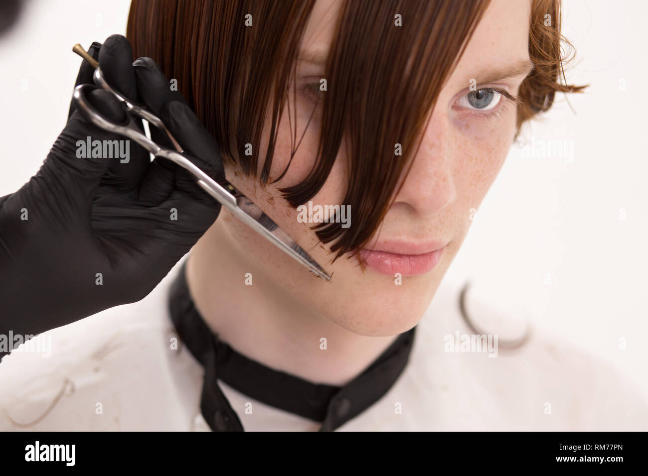 Closeup Of Man's Face When His Red Hair Is Being Cut Stock Photo - Alamy