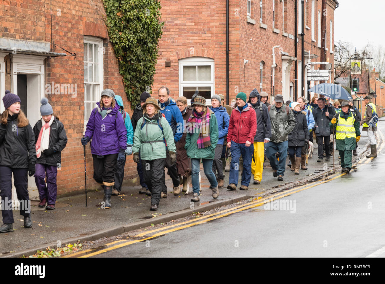 A large group of ramblers with outdoor gear in the rain on the Joseph ...