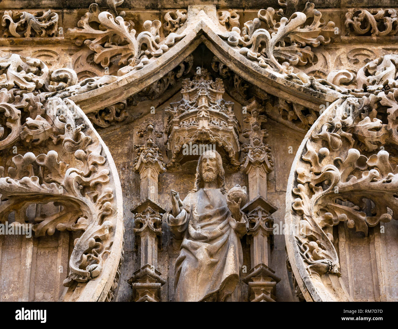 Detail of carved sandstone Jesus Christ figure, exterior of Cathedral ...