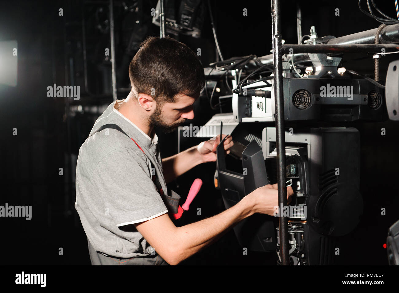 The lighting engineer adjusts the lights on the stage Stock Photo - Alamy