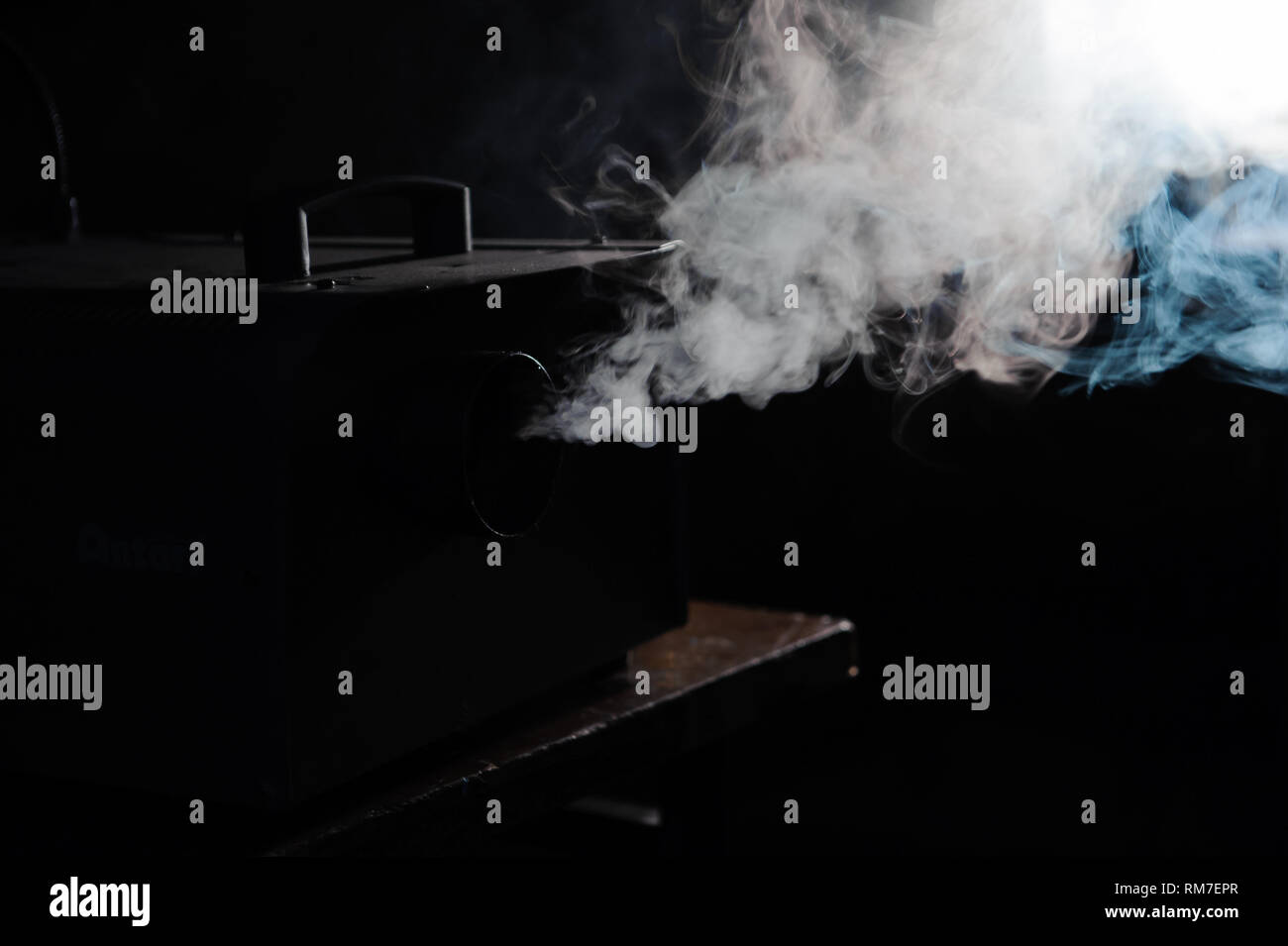 lights in smoke, studio lights shining through the smoke from smoke ...