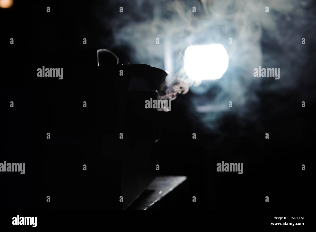 lights in smoke, studio lights shining through the smoke from smoke ...