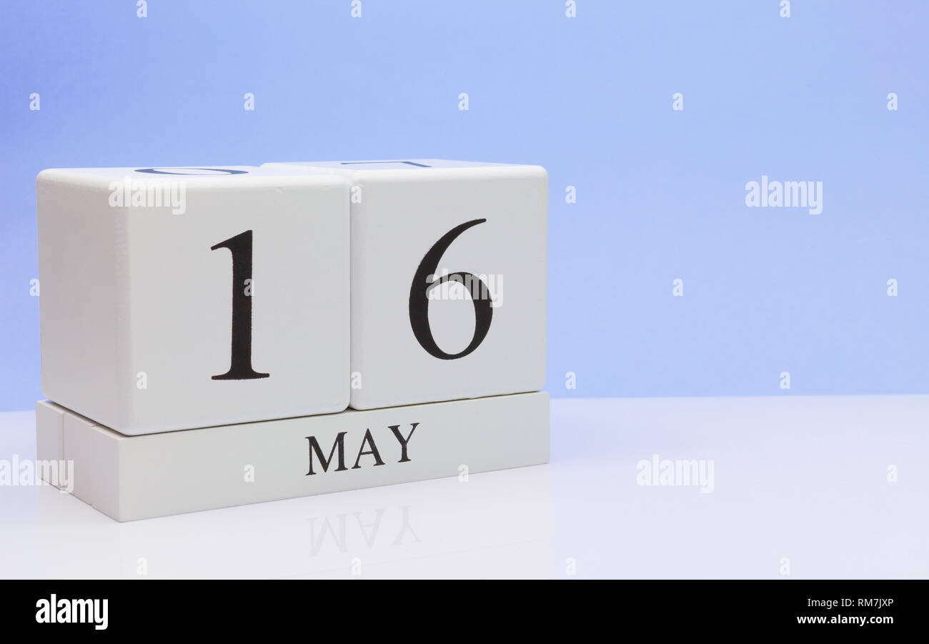 May 16st. Day 16 of month, daily calendar on white table with ...