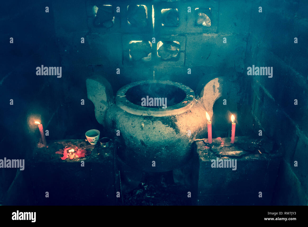 Simple Buddhist shrine with candles, Yunnan province, China Stock Photo ...