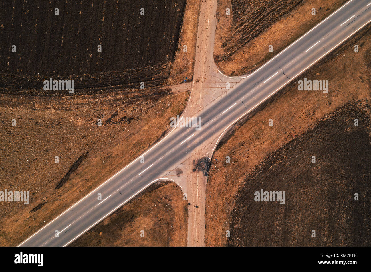 Aerial view of empty road through countryside landscape, abstract top ...