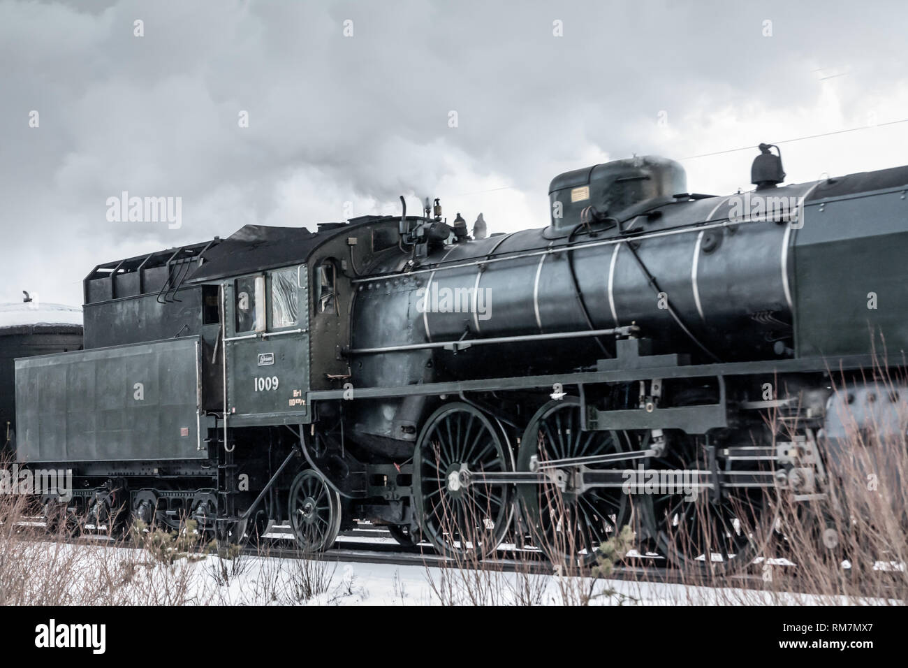KOUVOLA, FINLAND - DECEMBER 26, 2018: Steam train Ukko-Pekka going from ...